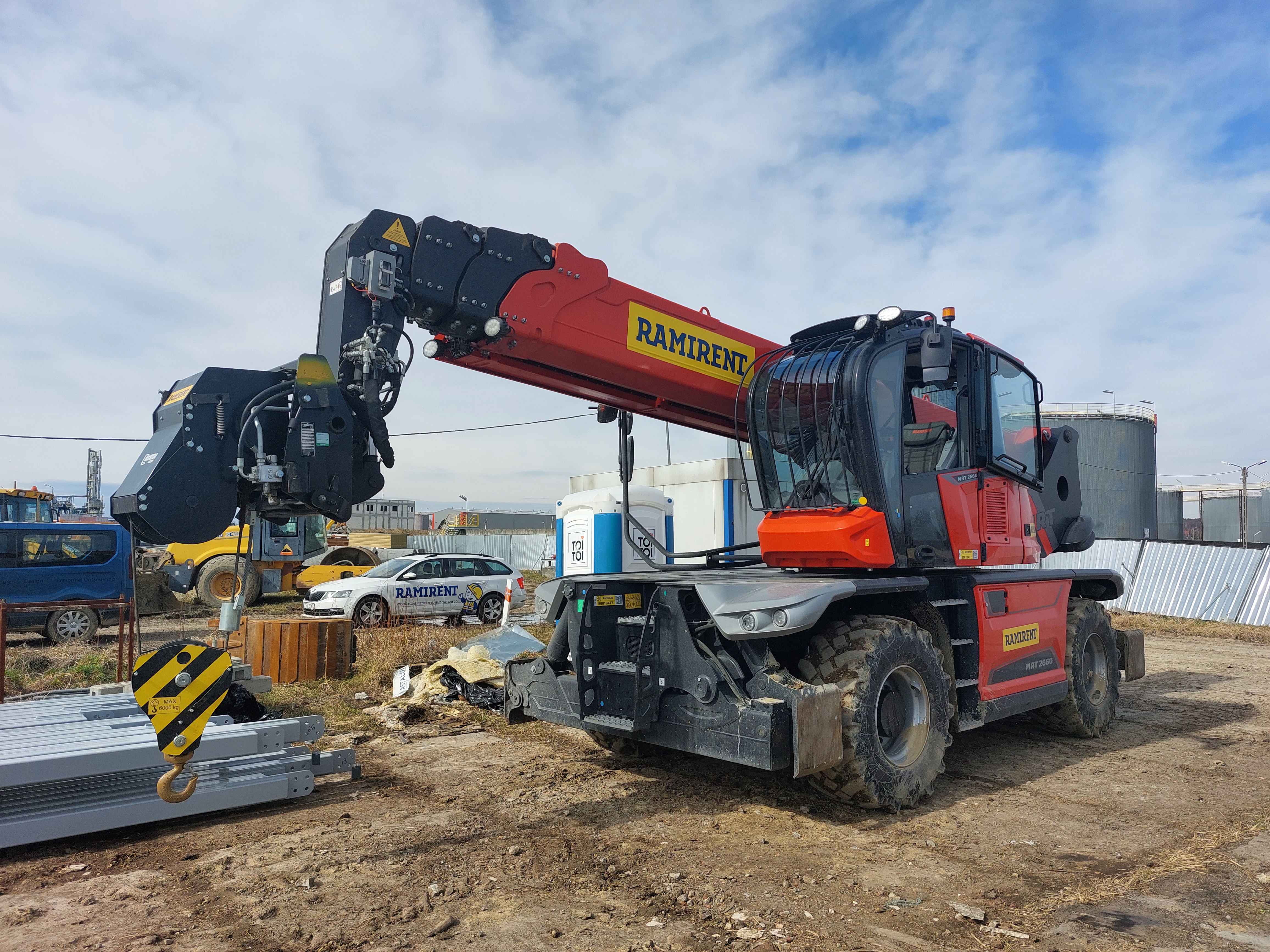 What is the maximum lift height and lifting capacity of a telehandler?